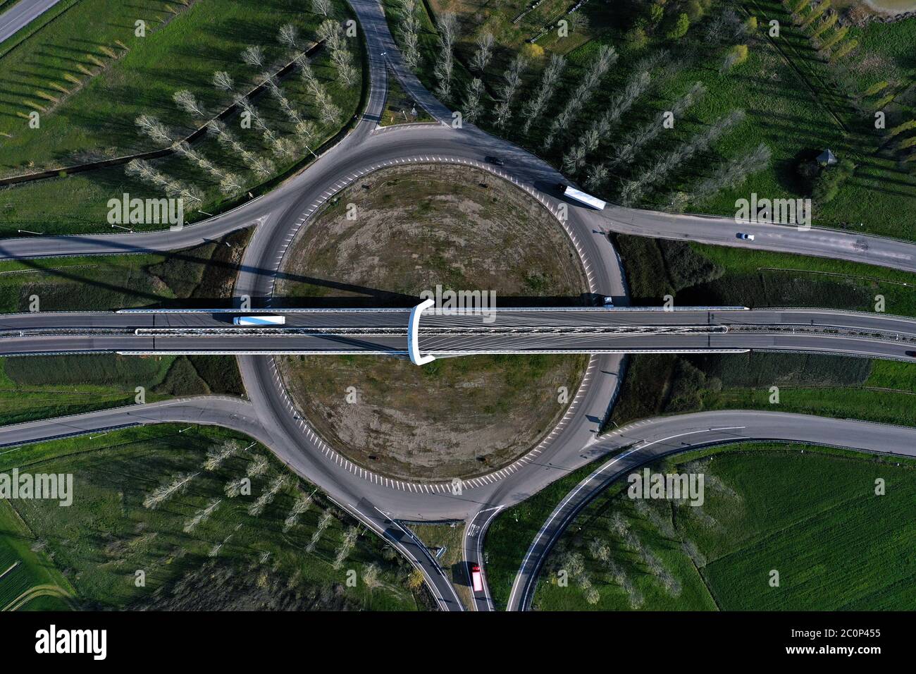 Reggio Emilia / Italy: aerial view of roundabout road with little car ...
