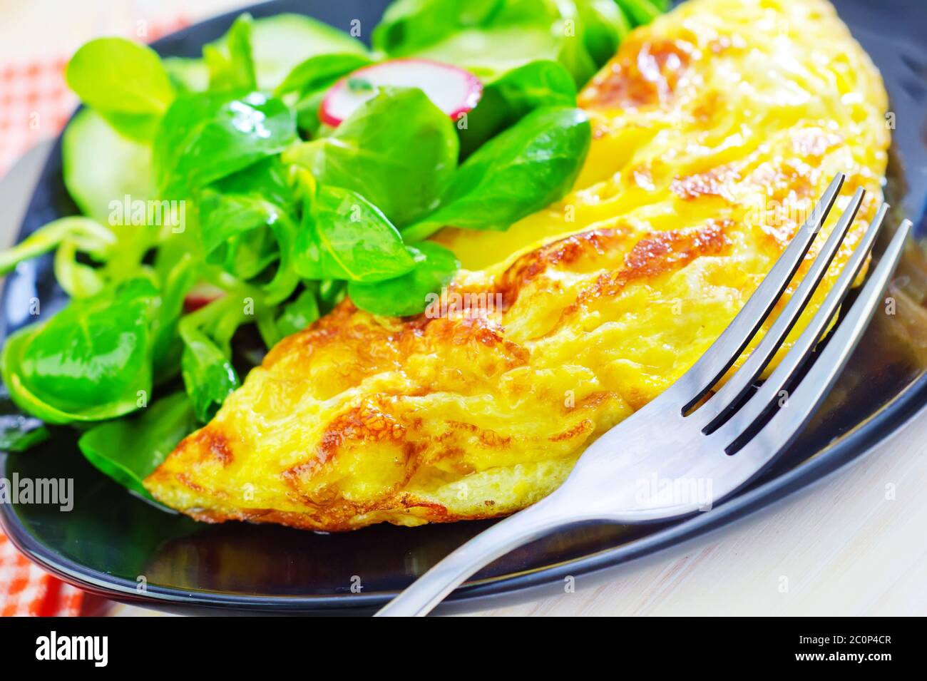 omelette with salad Stock Photo - Alamy