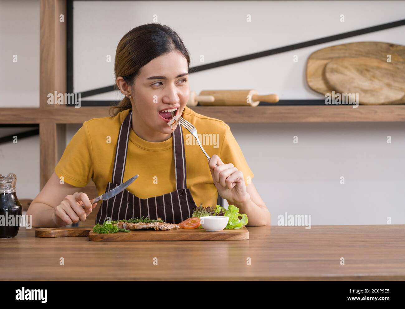 Steak eating woman hi-res stock photography and images - Alamy