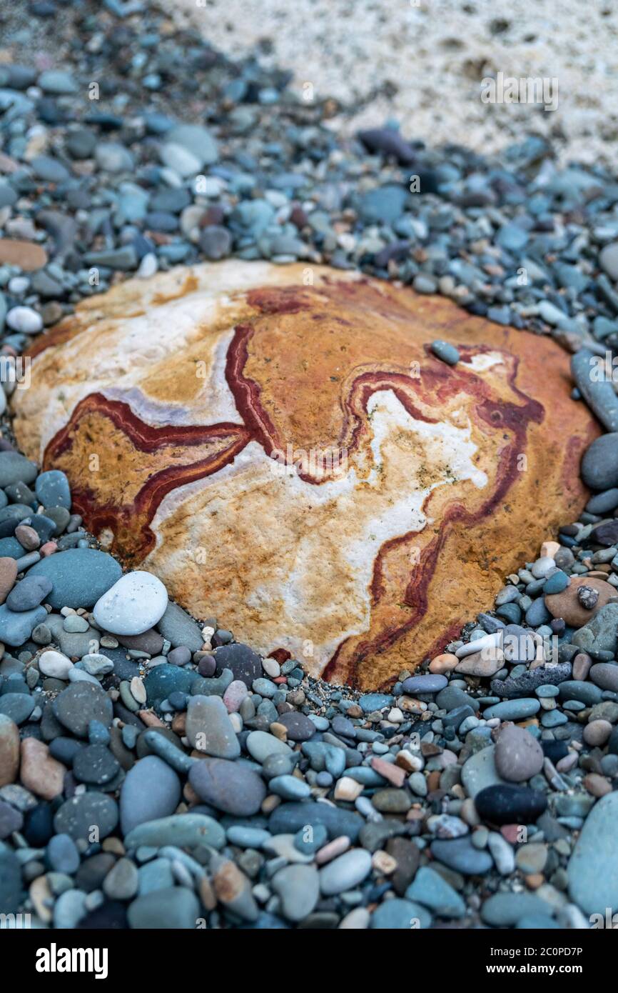 orange pebbles on the beach cape Fiolent Stock Photo - Alamy