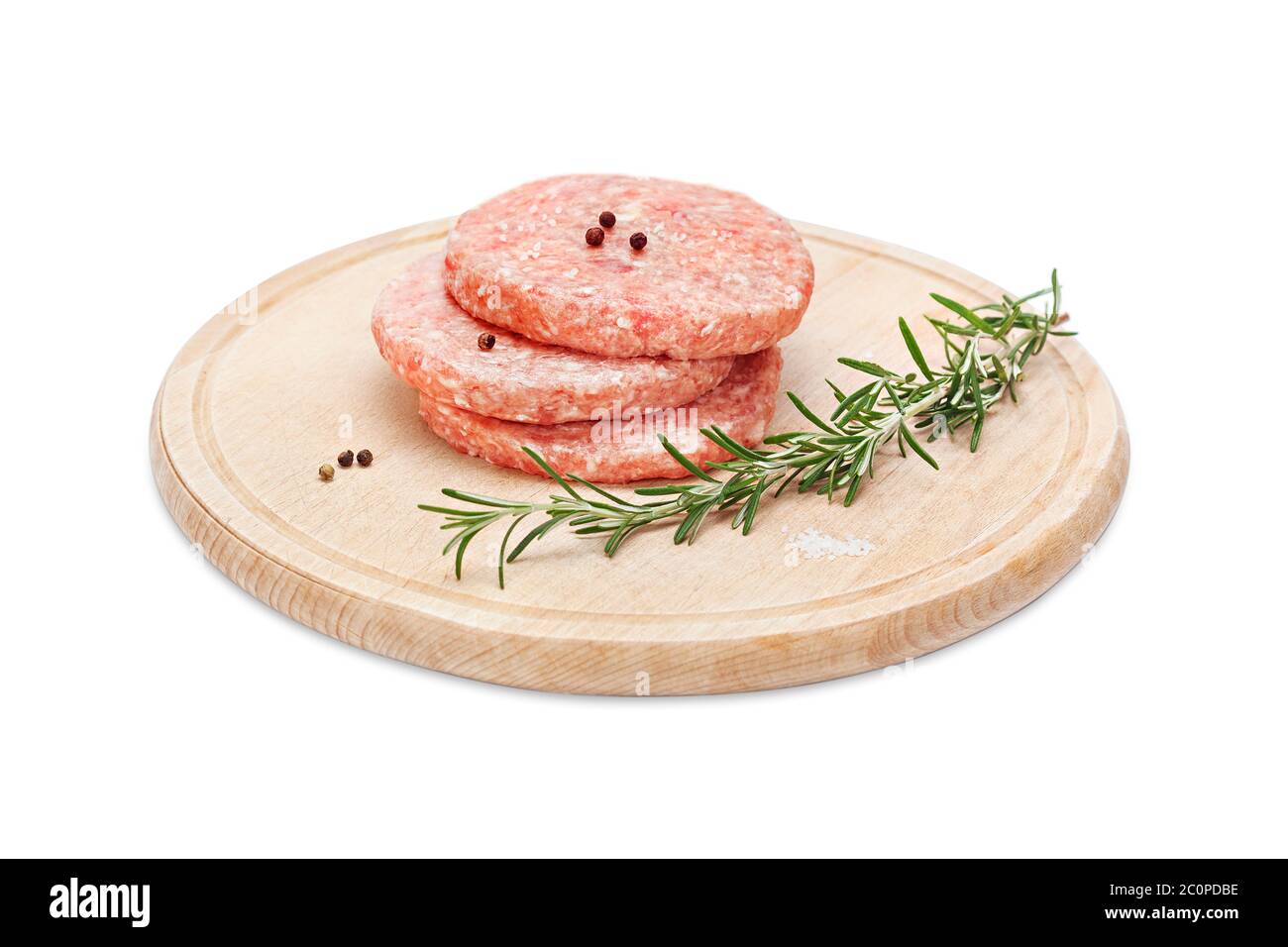 Fresh raw Chicken burger ready for preparation decorated with rosemary ...
