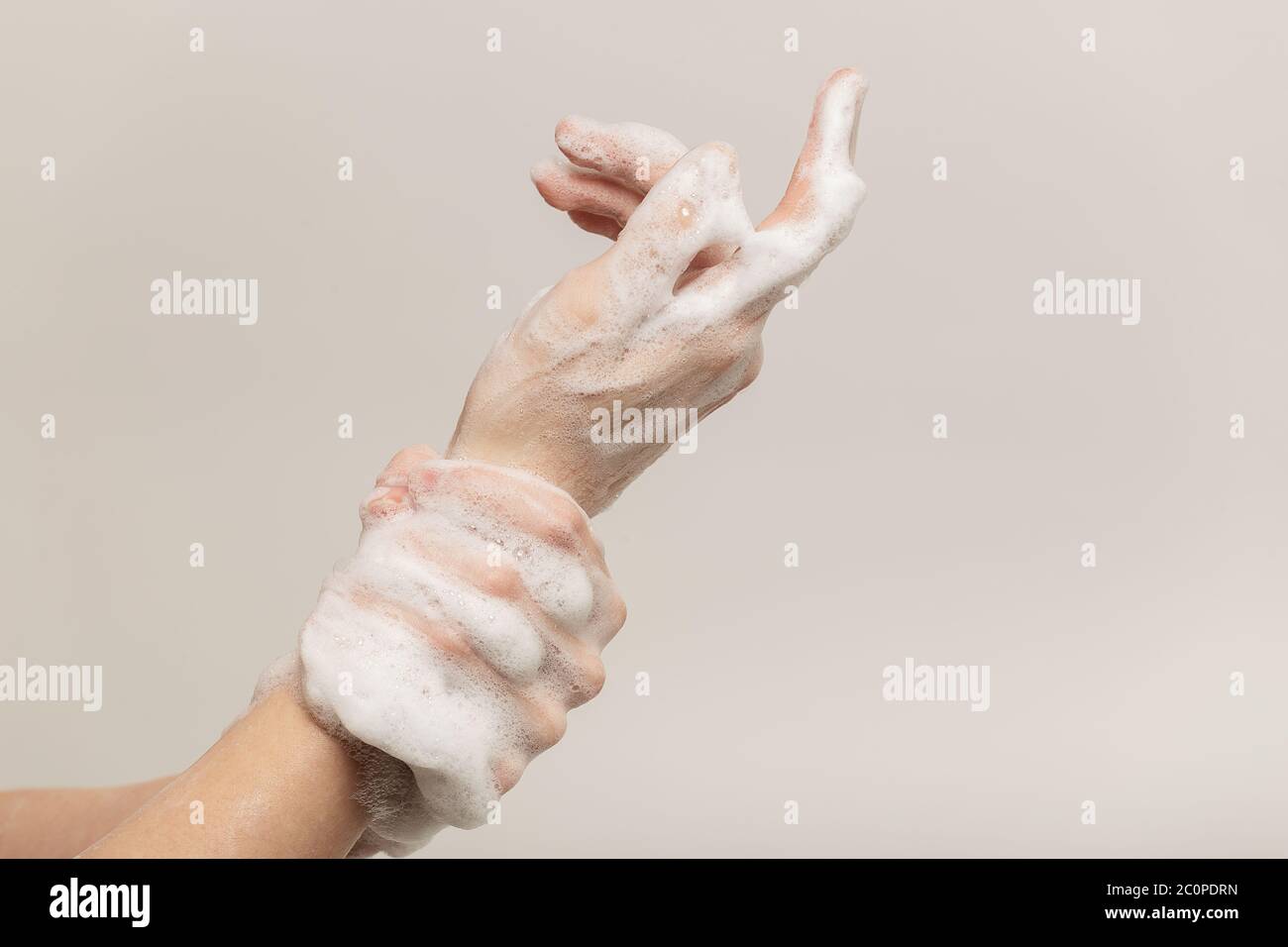 woman washing her arms closeup side view on white background Stock ...