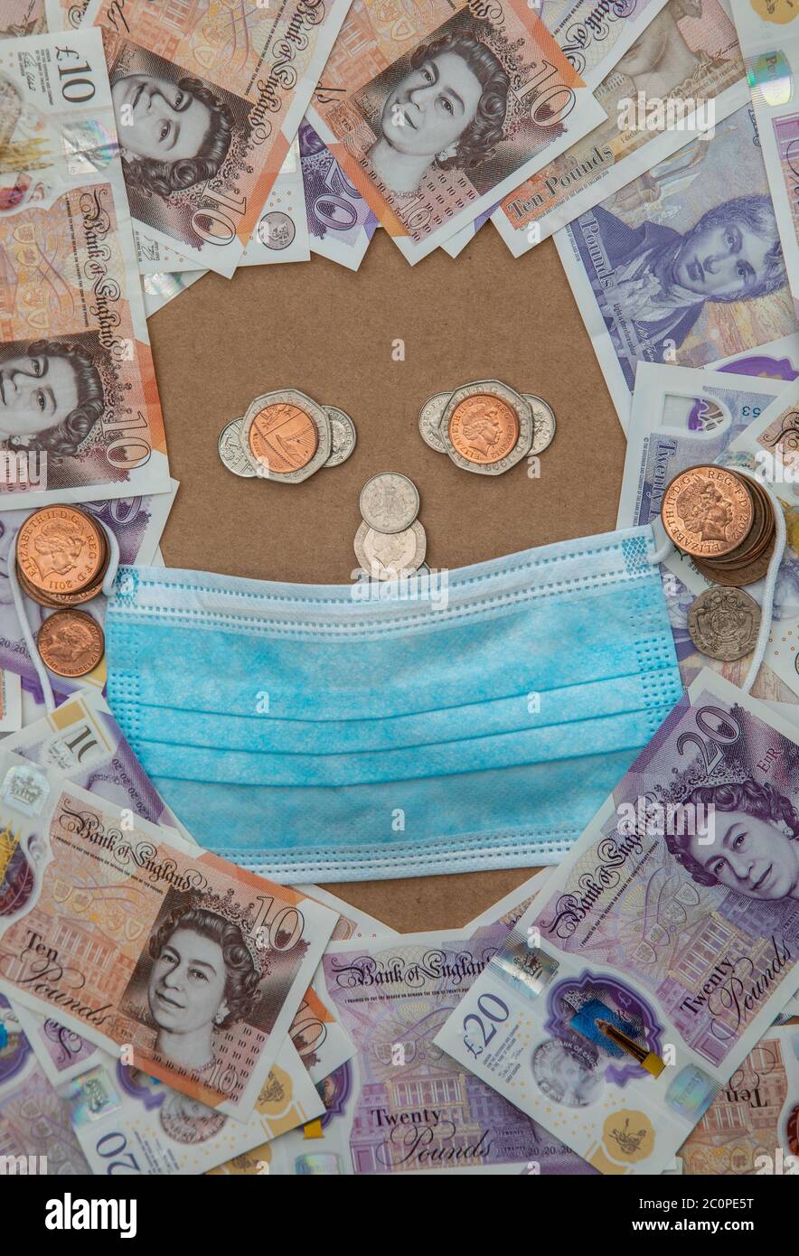 Financial Face made of money wearing a coronavirus mask Stock Photo - Alamy