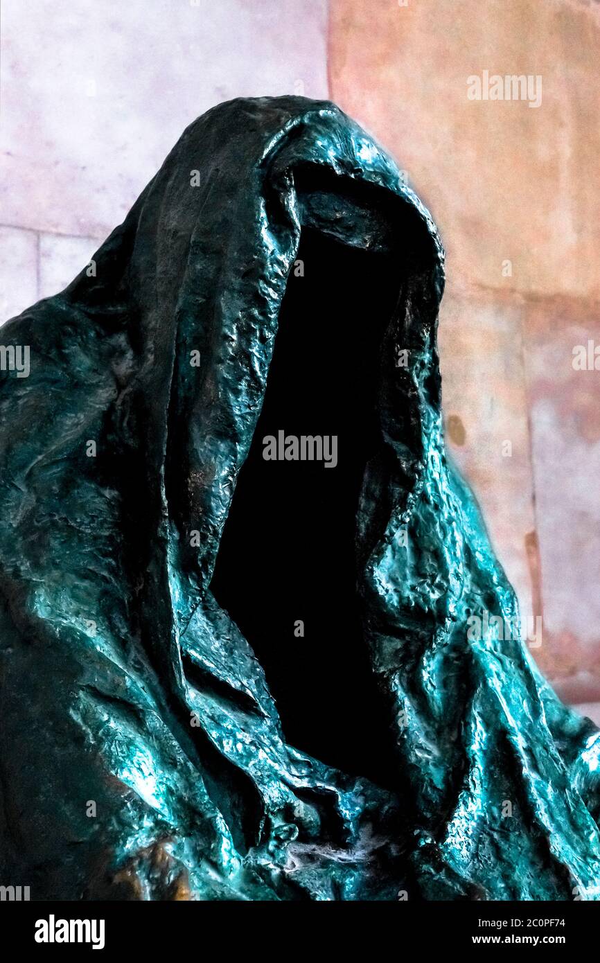 Vertical view of the Pietá statue by Anna Chromy at the side of the ...