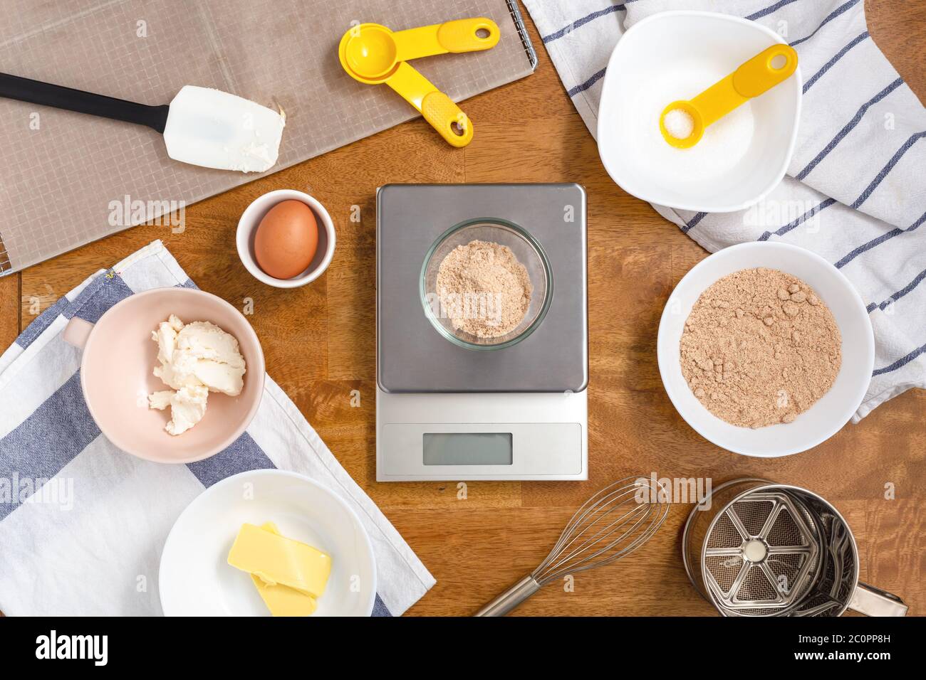 Cookie ingredients for baking with brown sugar on digital scale on ...