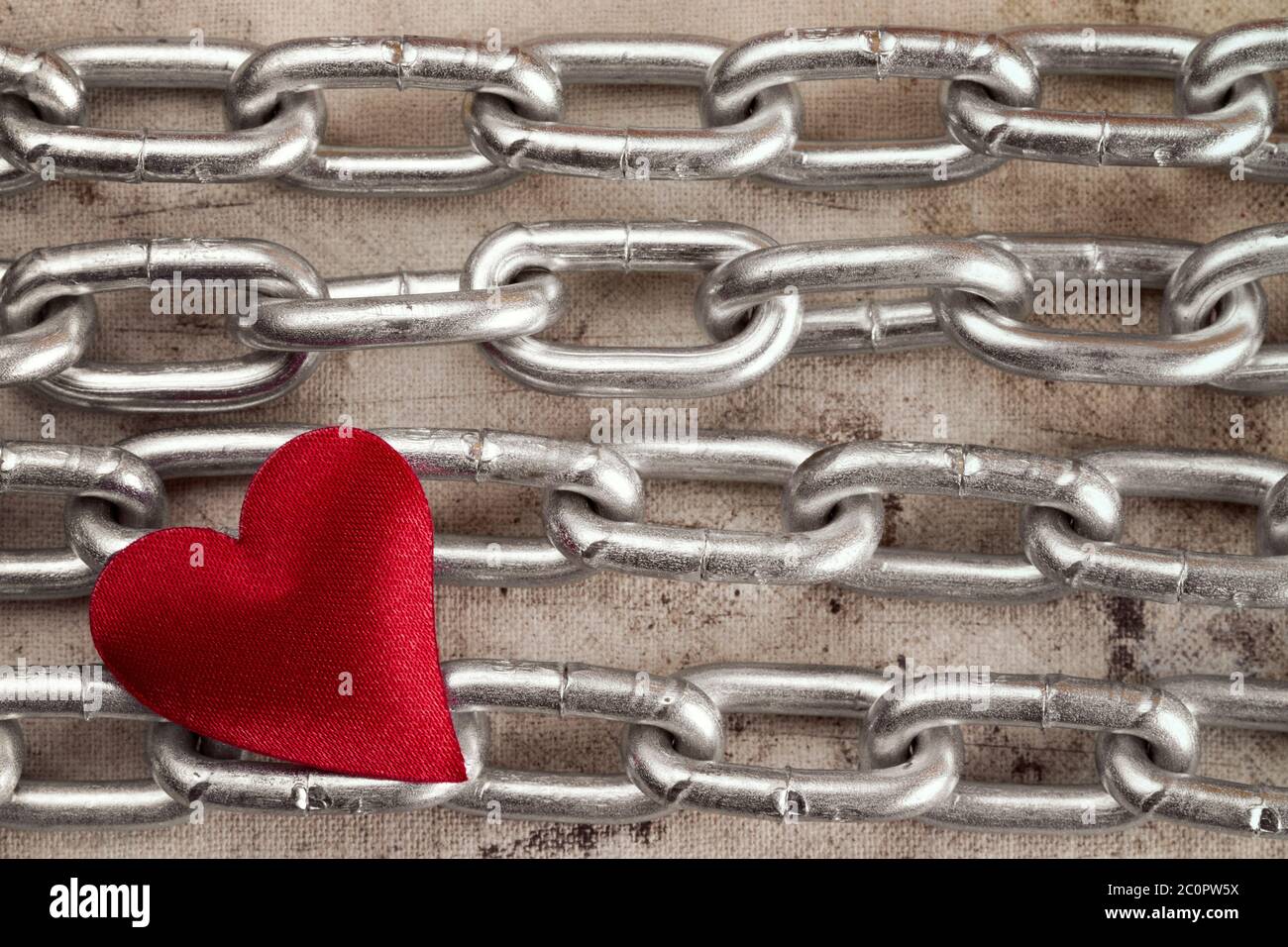 Four chains with red heart Stock Photo - Alamy