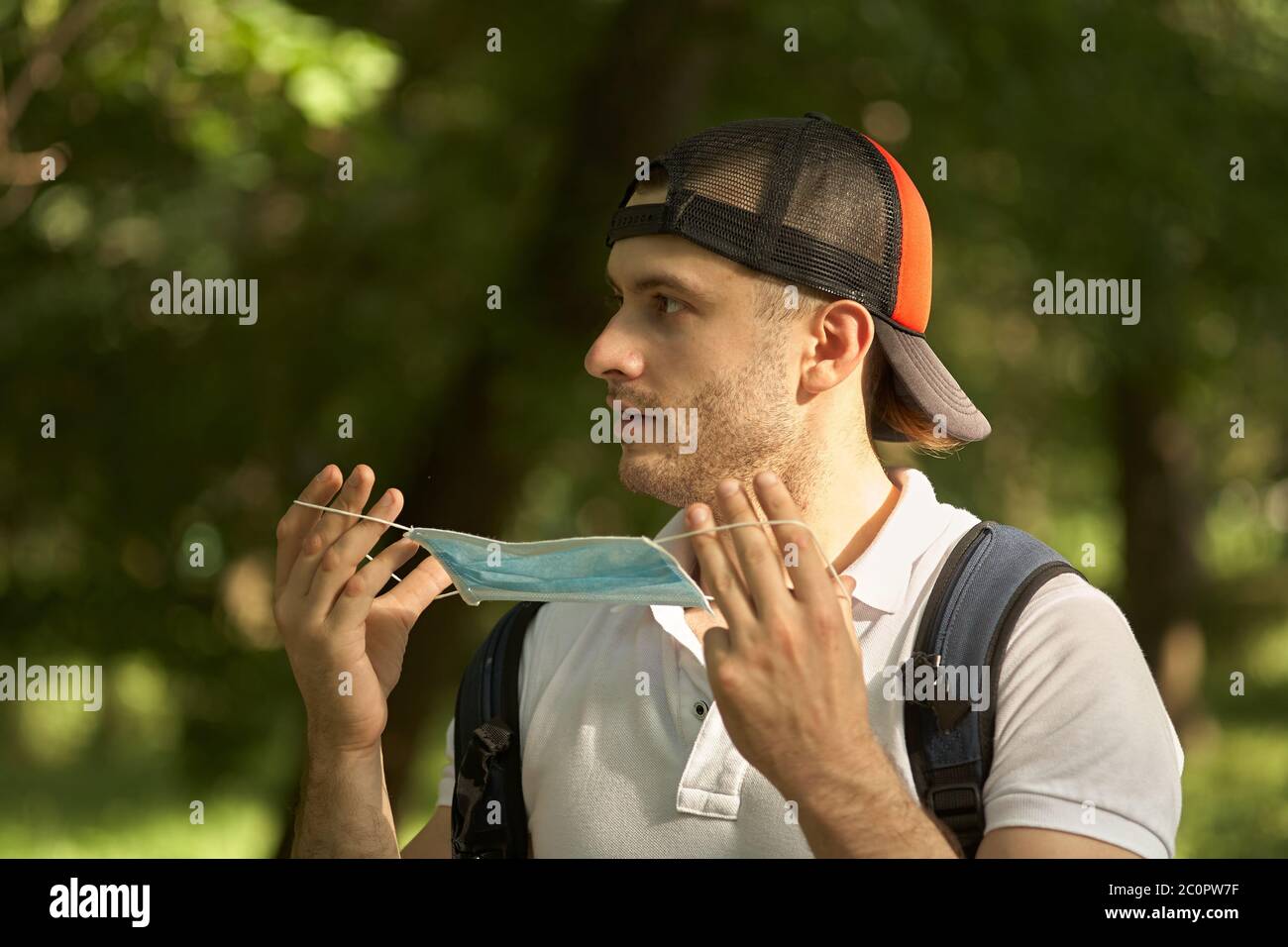 Guy takes off mask from hi-res stock photography and images - Alamy