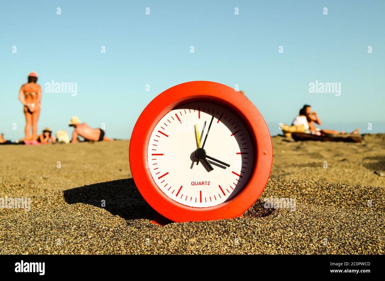 Vintage watch on sand beach hi-res stock photography and images - Alamy