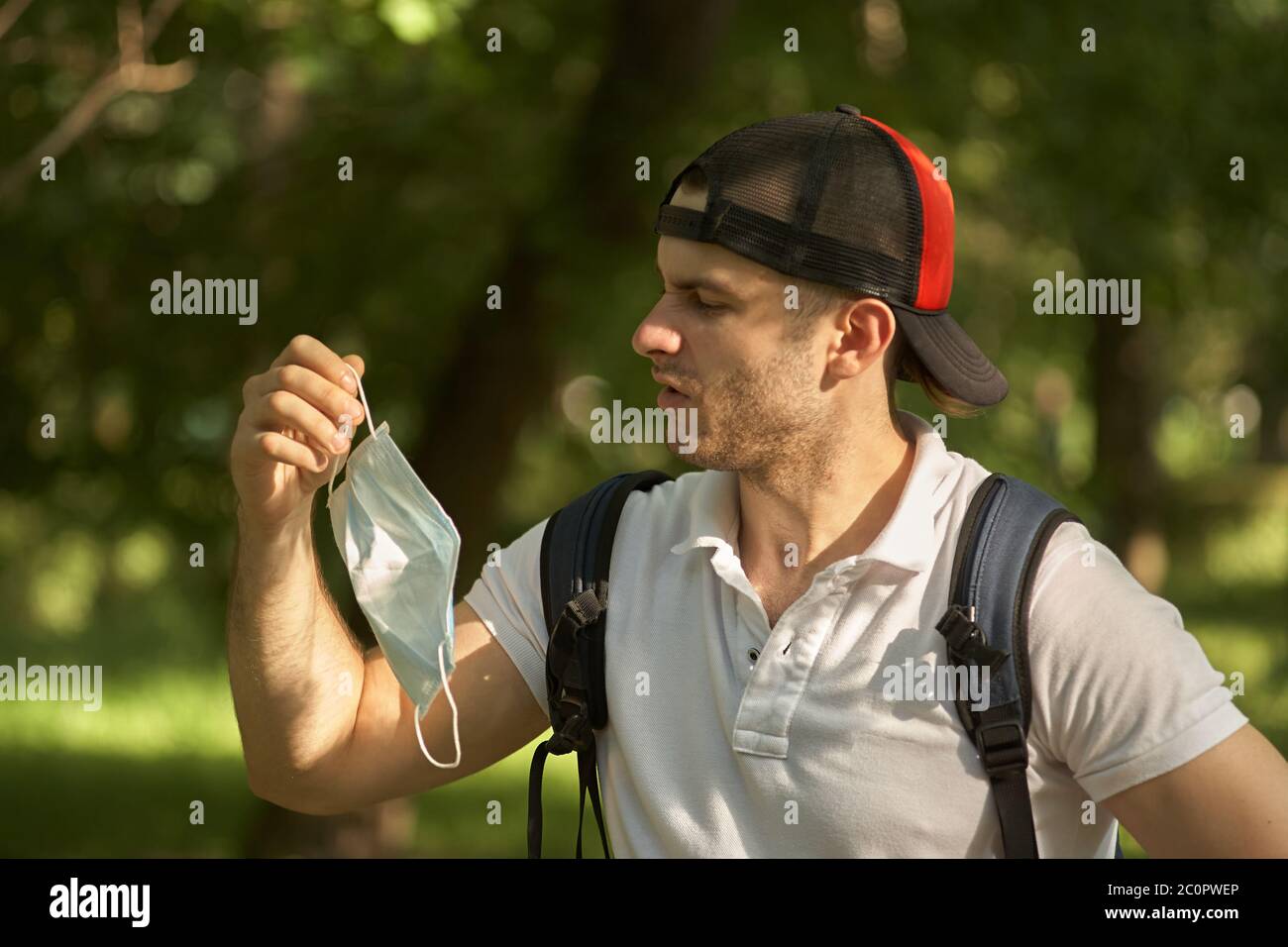 Guy takes off mask from hi-res stock photography and images - Alamy