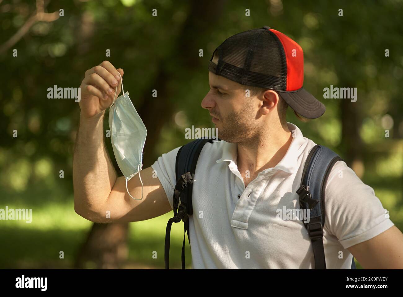 Guy takes off mask from hi-res stock photography and images - Alamy