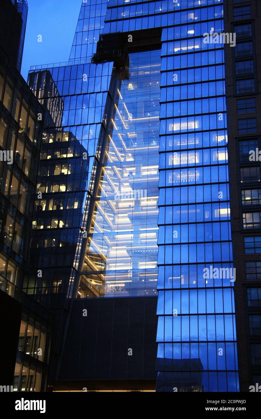 Glazed facade building in New York City viewed from below on the High ...