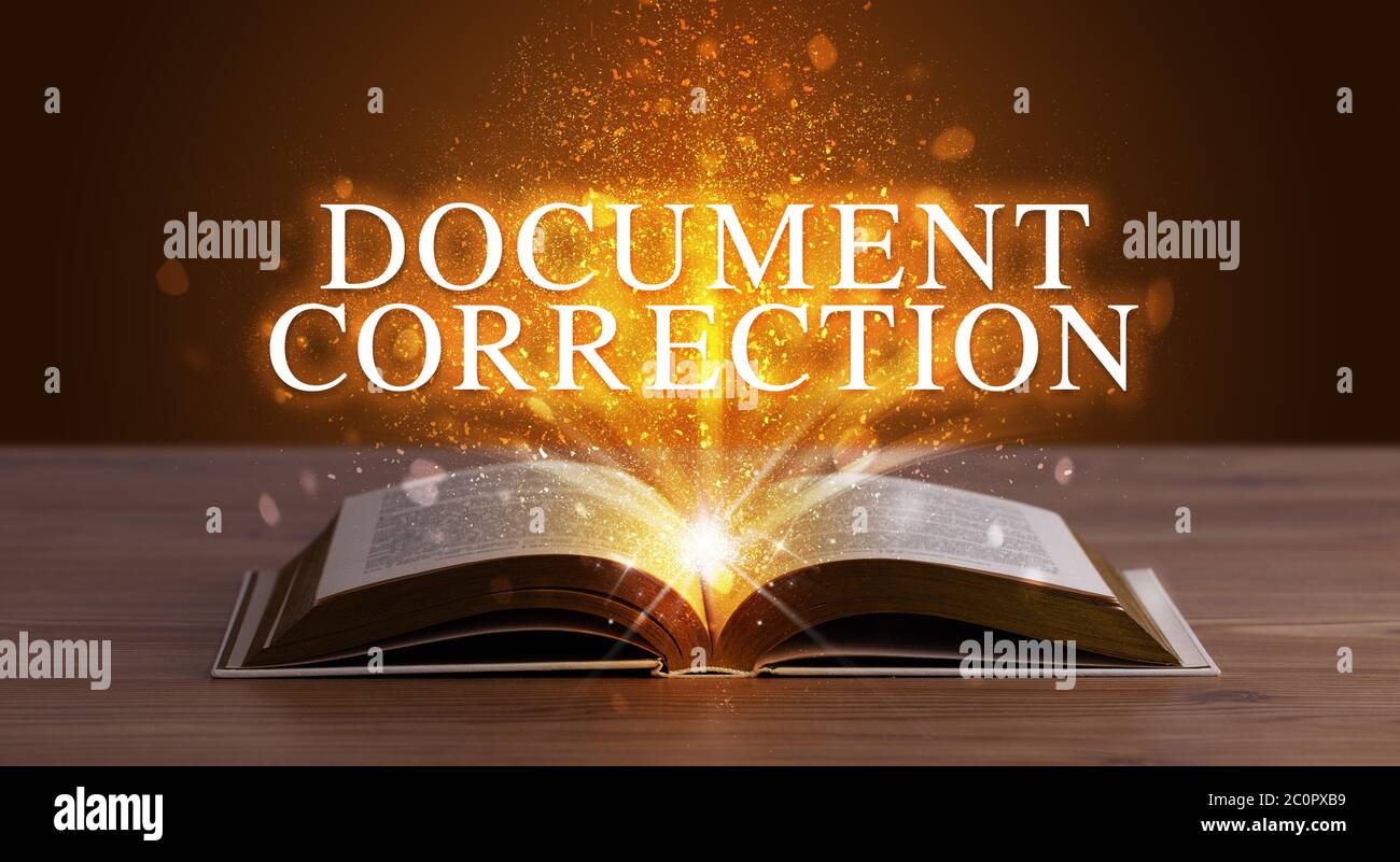 DOCUMENT CORRECTION inscription coming out from an open book ...