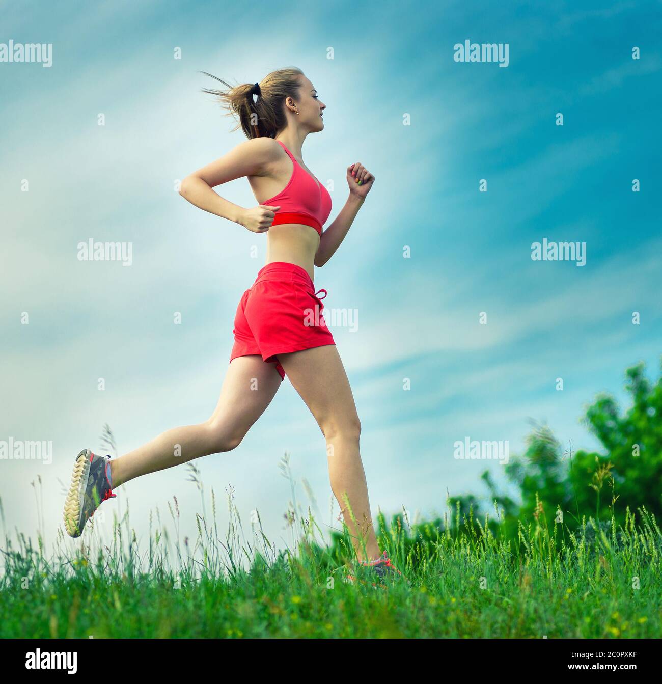 Young woman running summer park rural road. Outdoor exercises. J Stock ...