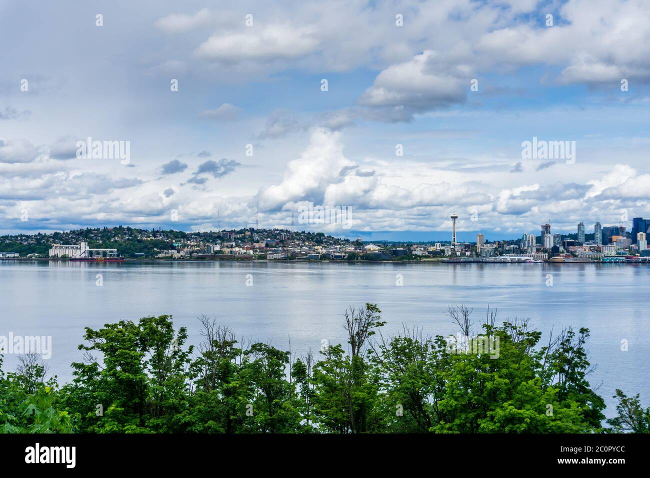 Fluffy clouds hover over Seattle, Washington Stock Photo - Alamy
