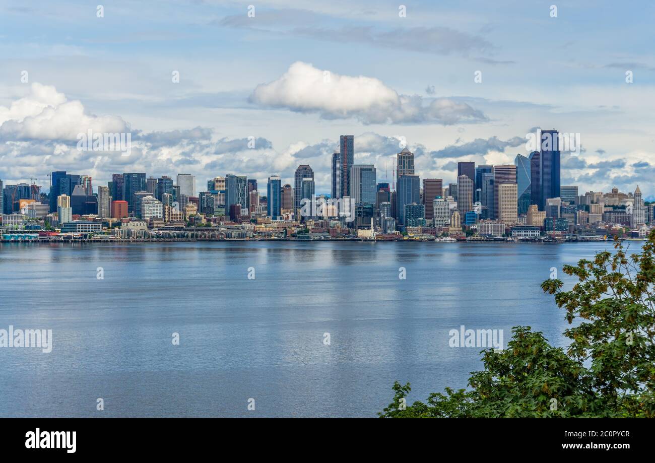 Fluffy clouds hover over Seattle, Washington Stock Photo - Alamy
