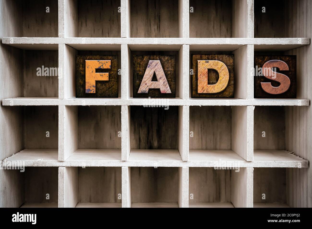 Fads Concept Wooden Letterpress Type in Draw Stock Photo - Alamy