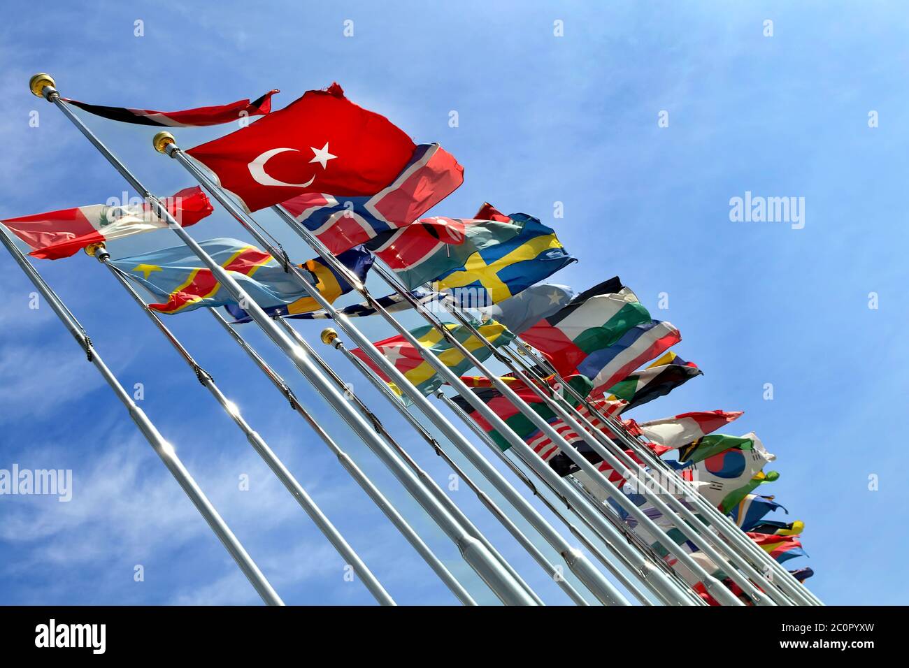 Different countries flags united together against blue sky Stock Photo ...