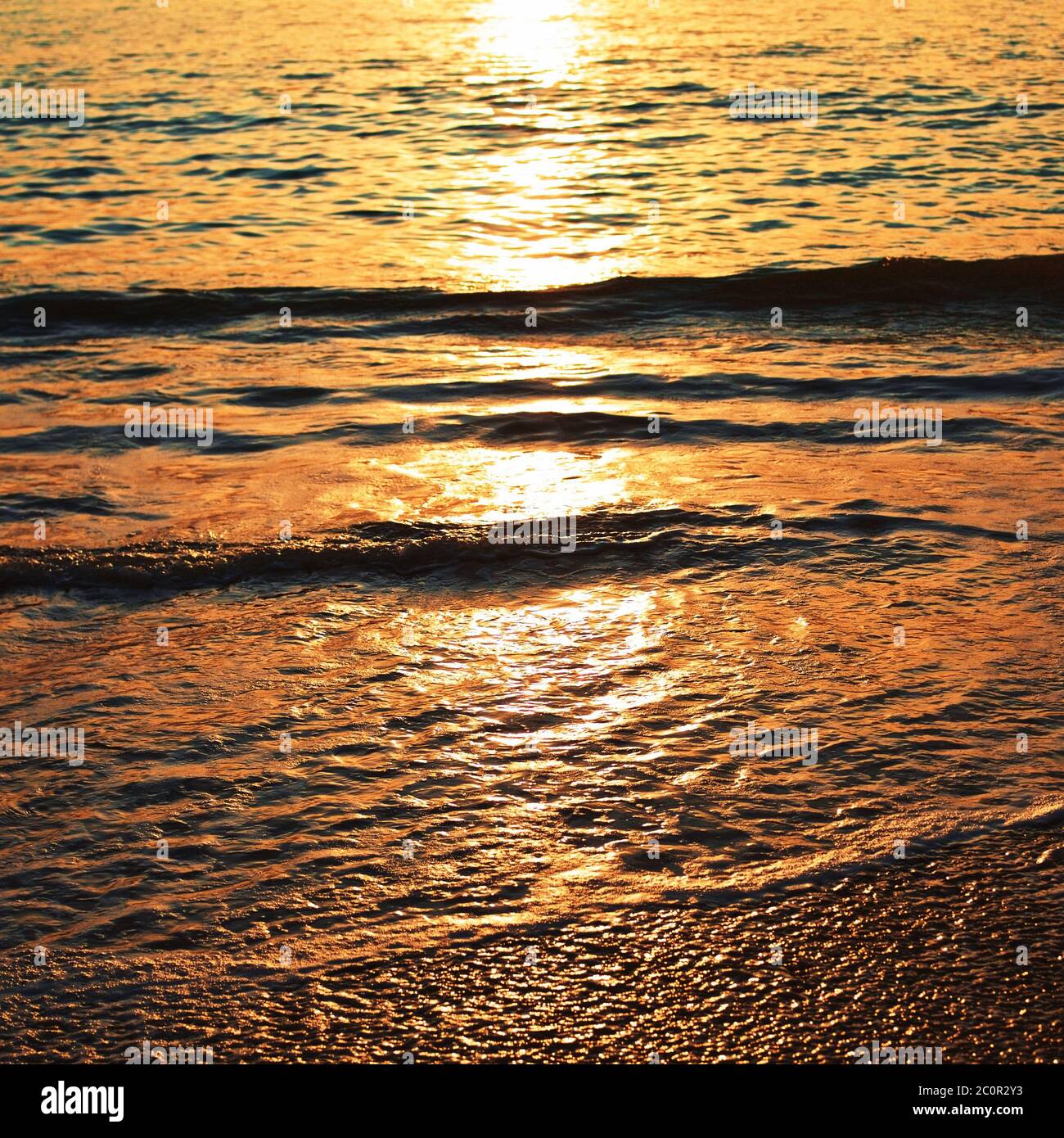 Sea Surface at Sunset Stock Photo - Alamy