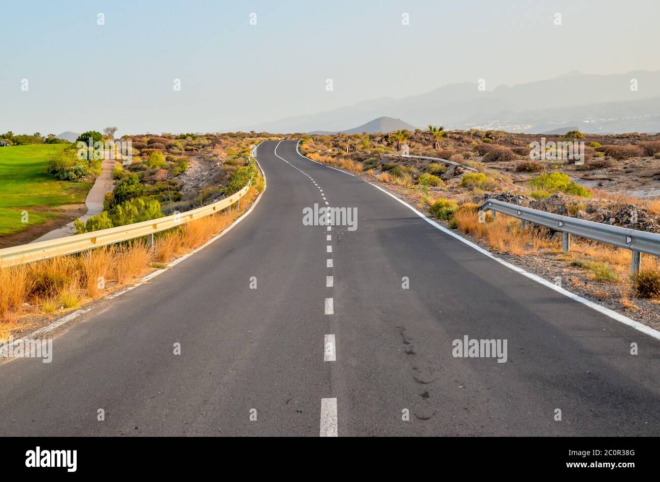 Long Lonely Road Stock Photo - Alamy
