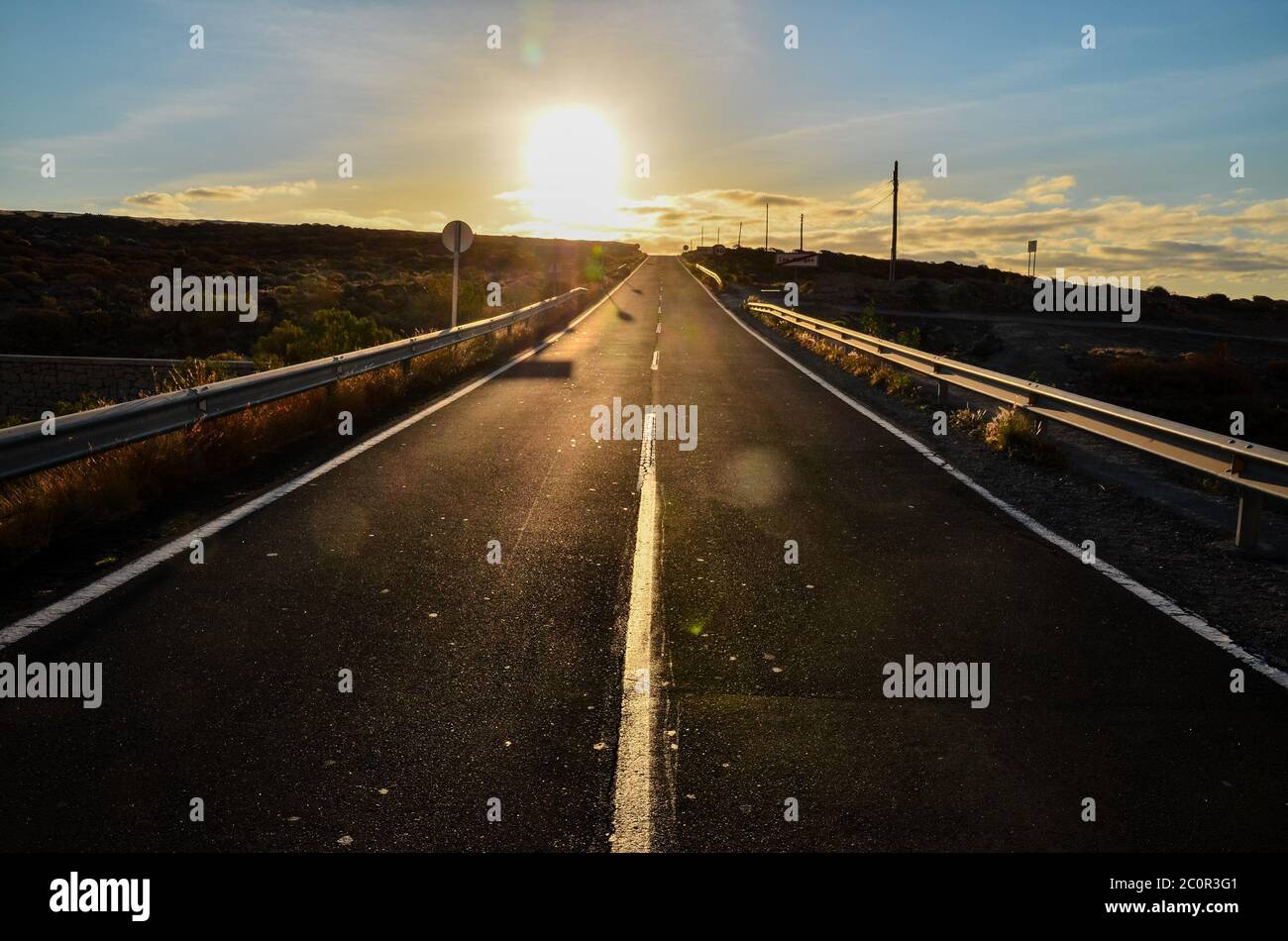 Long Lonely Road Stock Photo - Alamy