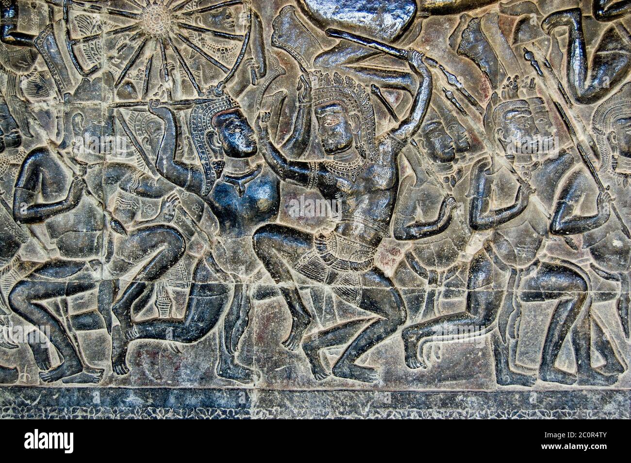 An ancient bas relief frieze on a wall of Angkor Wat Temple in Siem ...