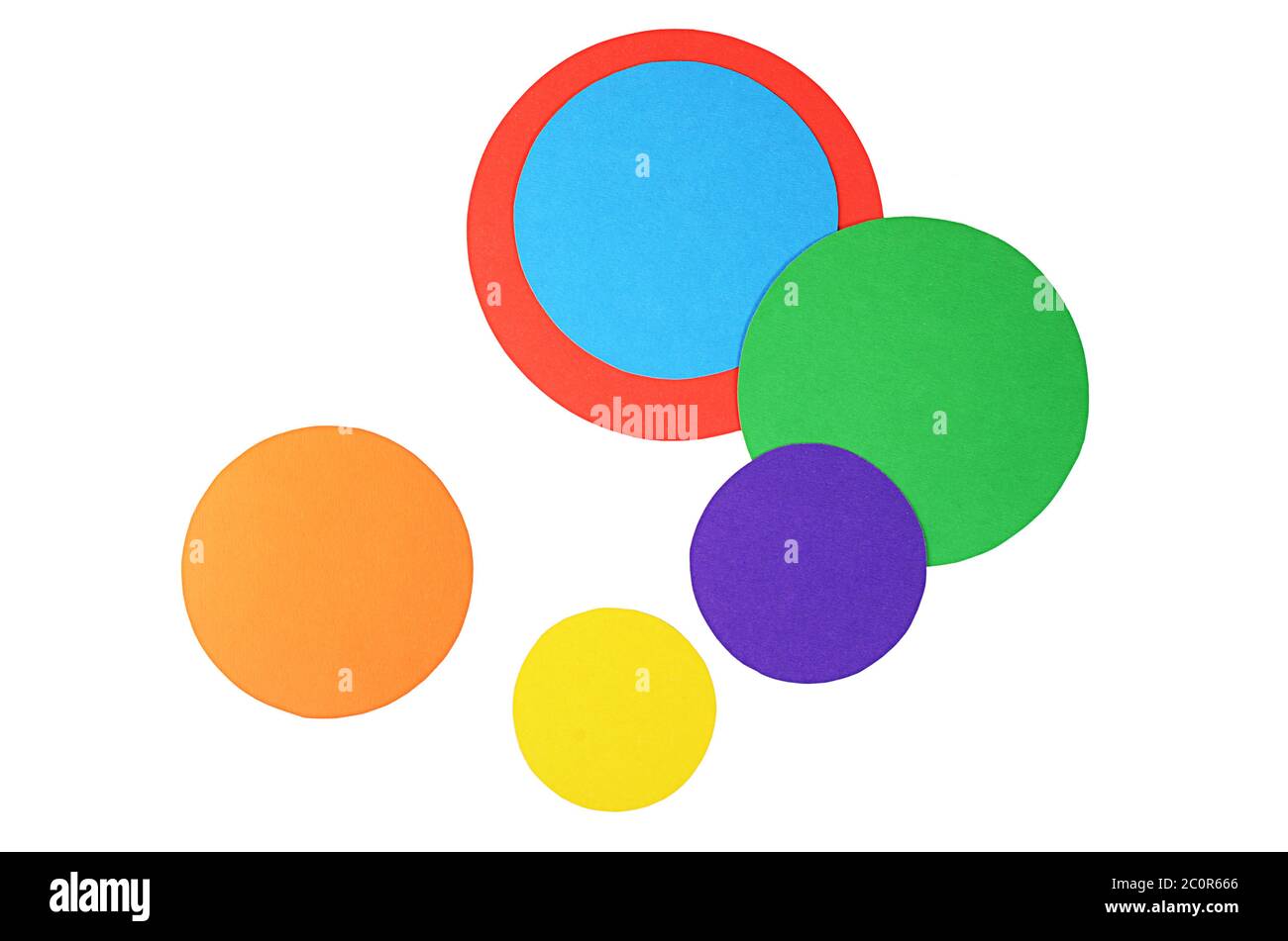 Circles color paper isolated on white Stock Photo - Alamy
