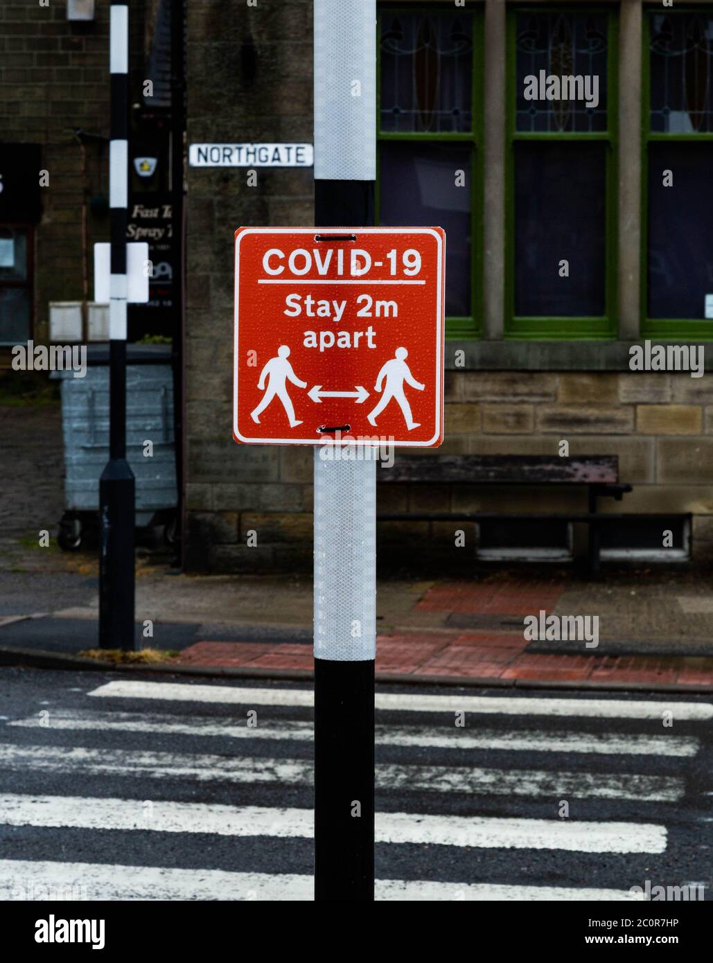 Covid-19 signs in Baildon, Yorkshire, warning people to walk 2 metres ...