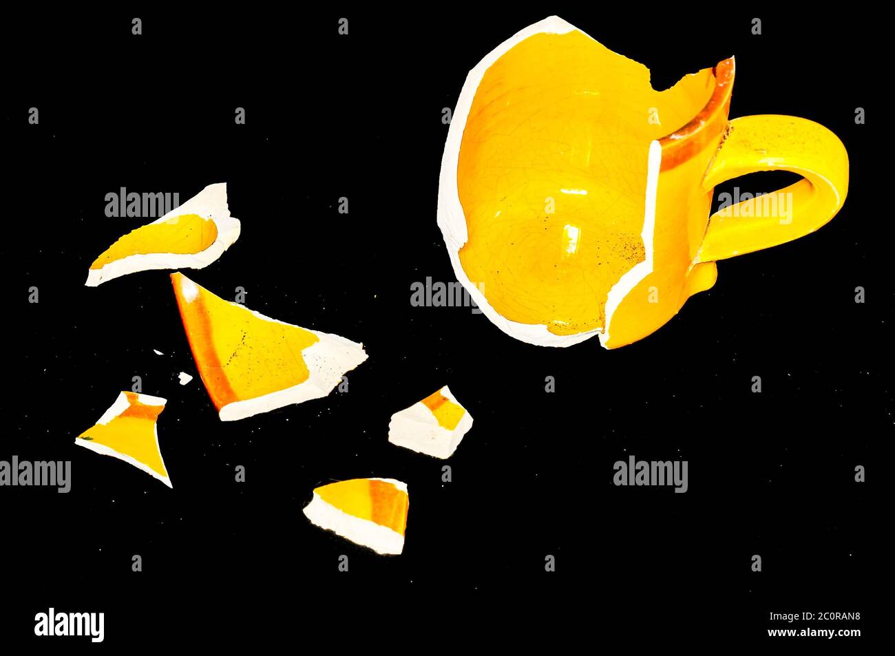 Broken Orange Coffe Cup Stock Photo - Alamy