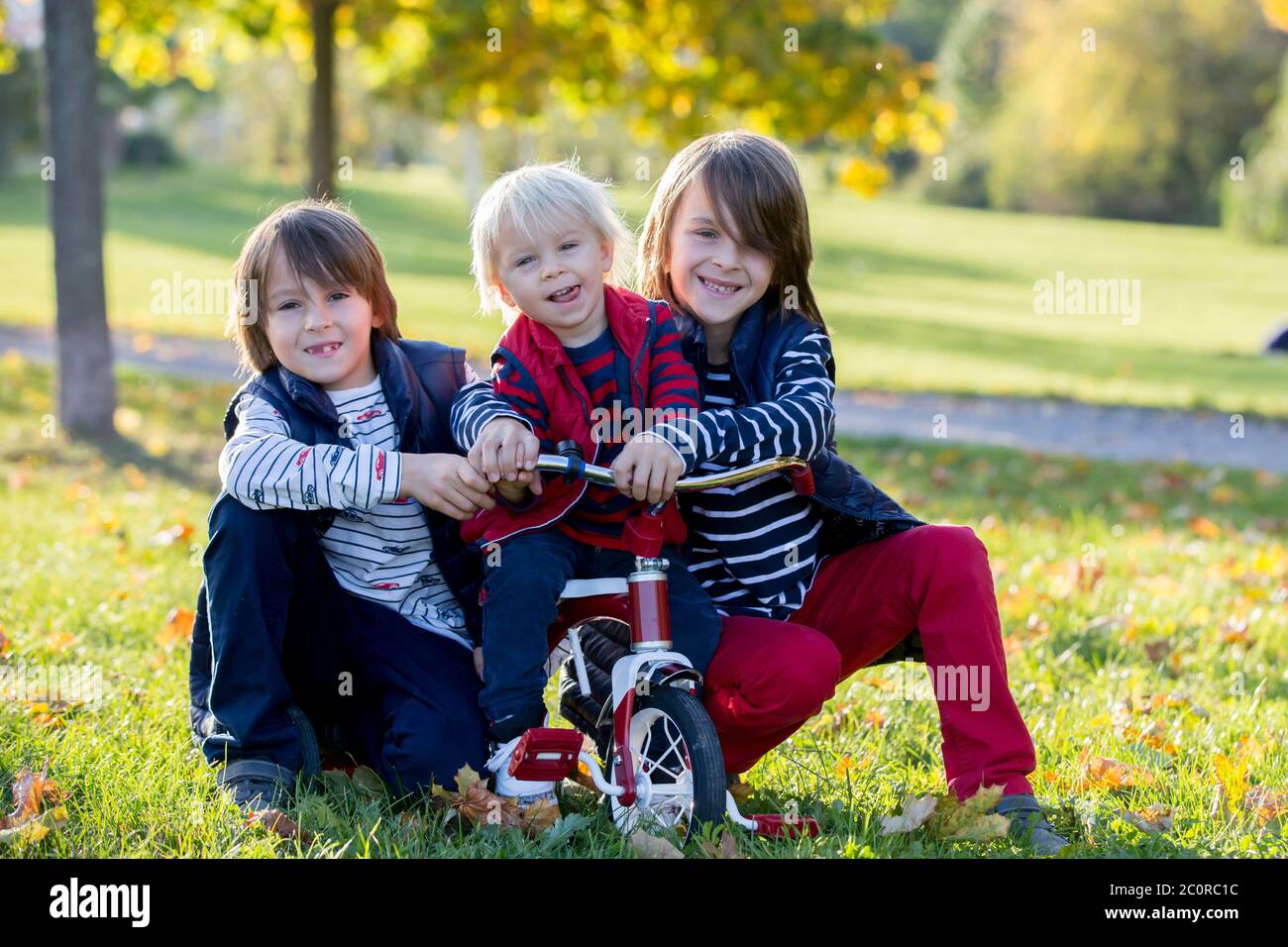 Baby laughing in older brothers hi-res stock photography and images - Alamy