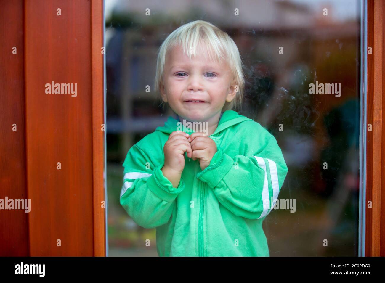 Child crying at the front door hi-res stock photography and images - Alamy