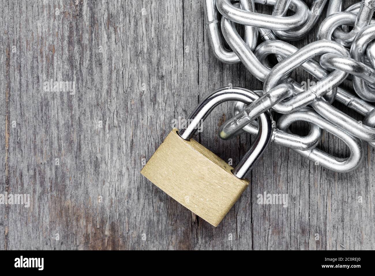 Chains with locked lock Stock Photo - Alamy