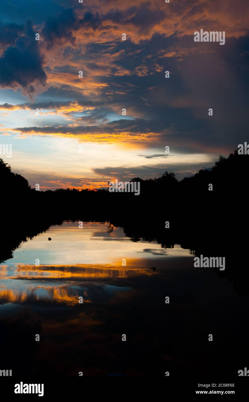 Breathtaking Sunset with reflection on river Stock Photo - Alamy