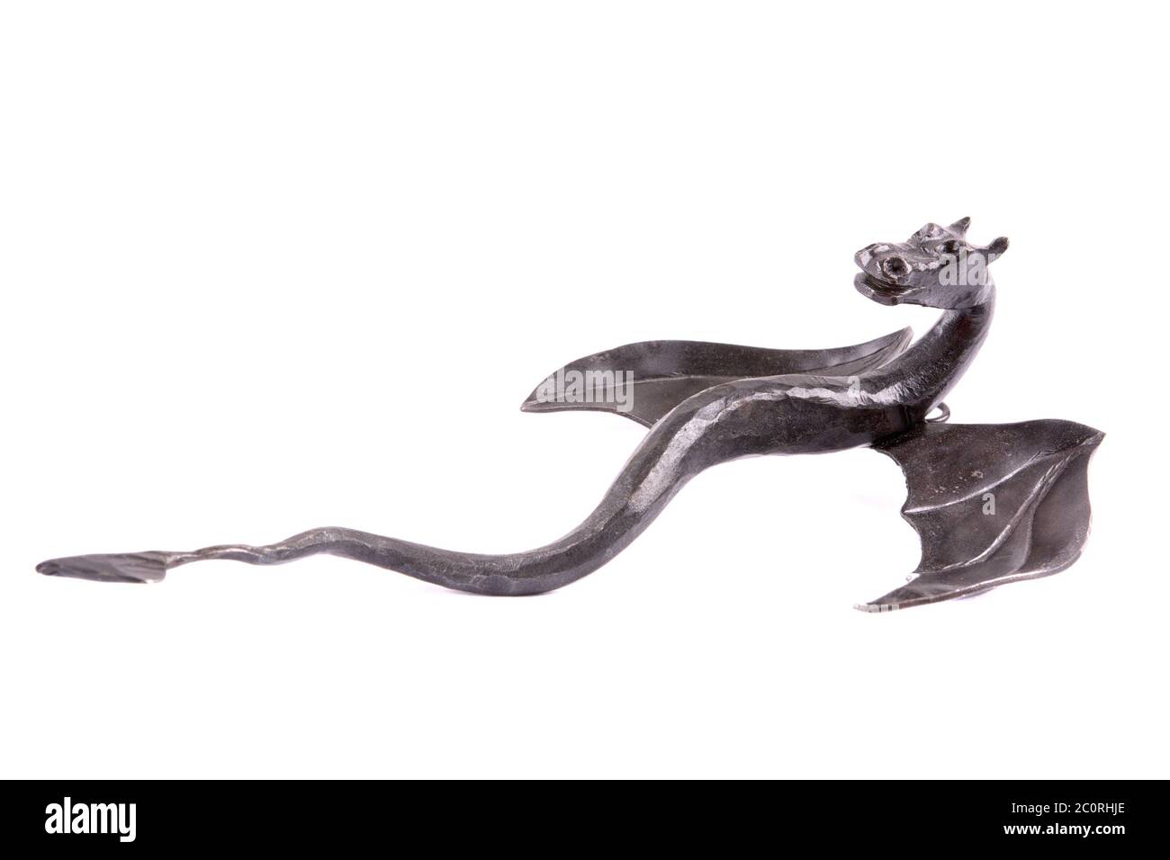 Forged dragon on a white background Stock Photo - Alamy