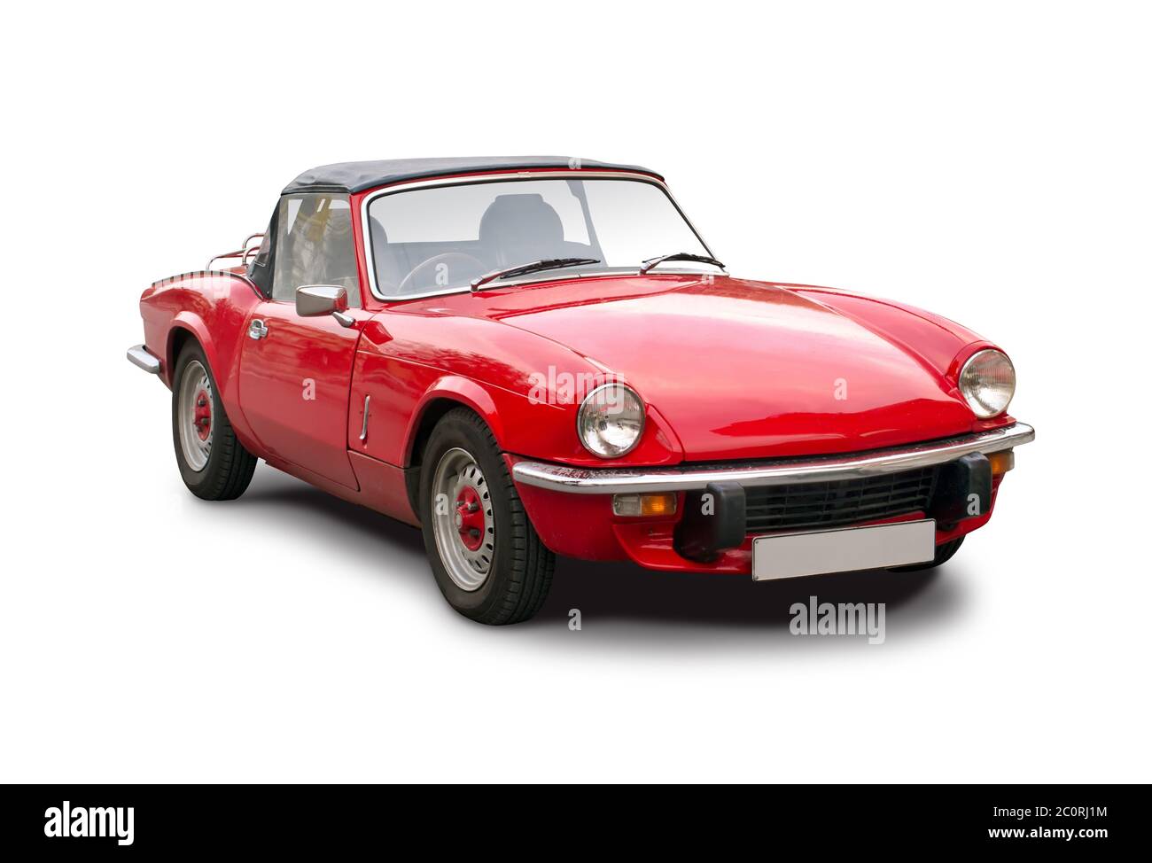 Classic British red sport cabrio car isolated on white Stock Photo - Alamy