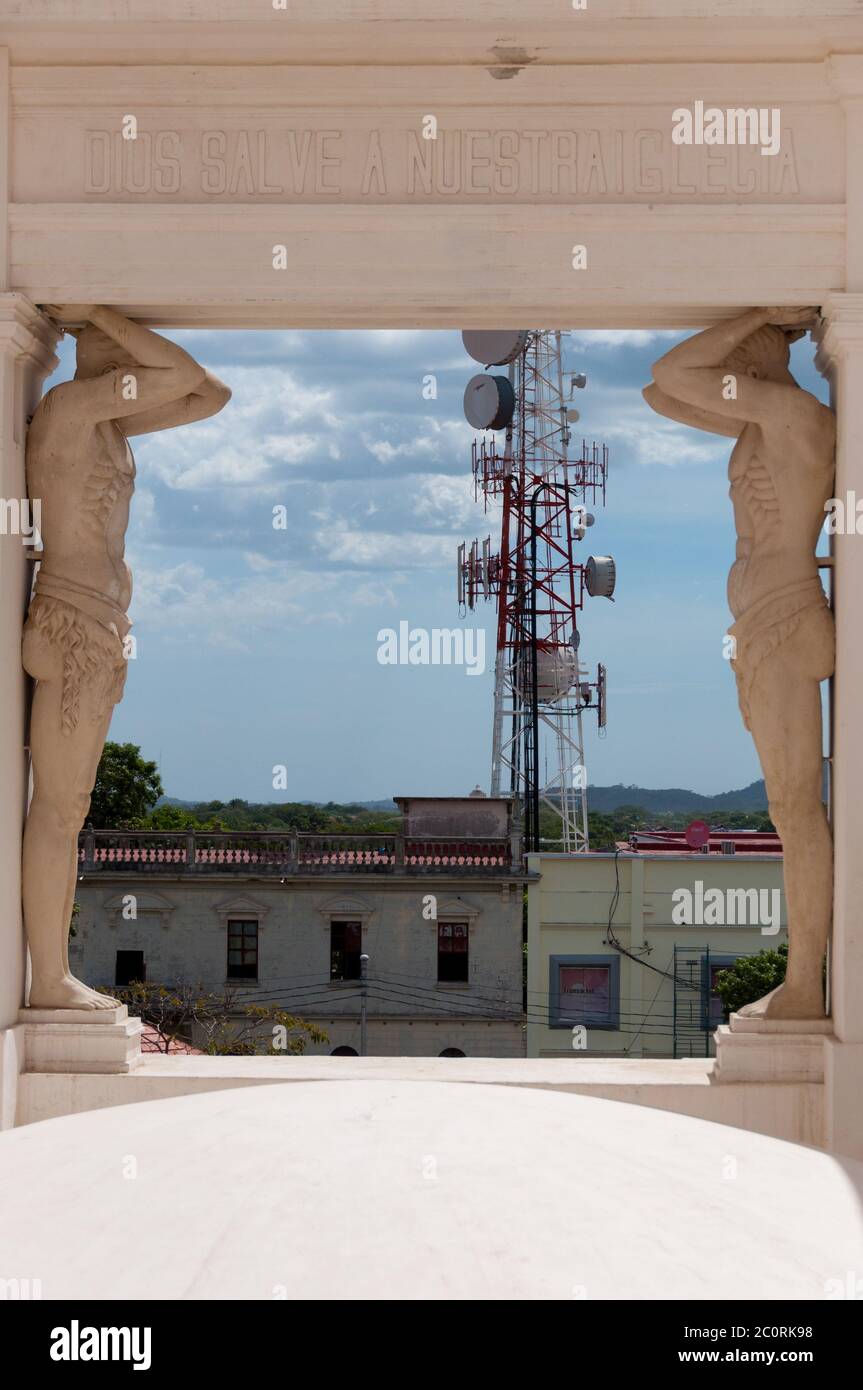 Two Tall stone Statue on Each Side of the Hall in front o houses and ...