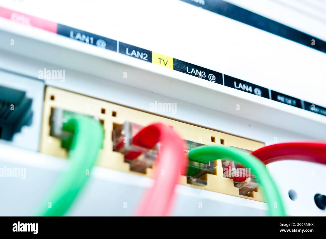 sockets and cables on the back of a broadband Ethernet router Stock ...