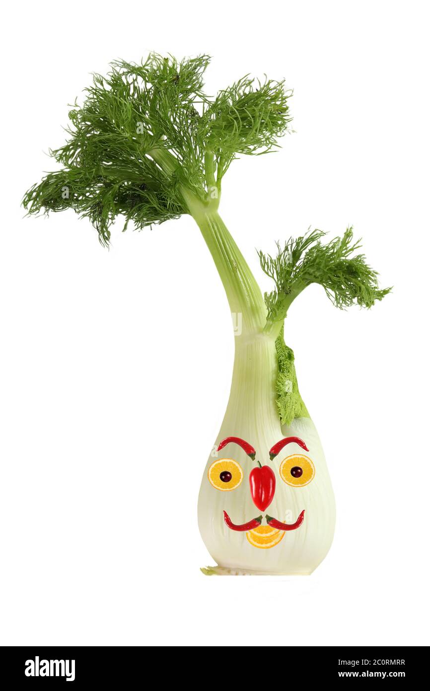 Funny face made of fennel, pepper and orange. A creative food concept ...