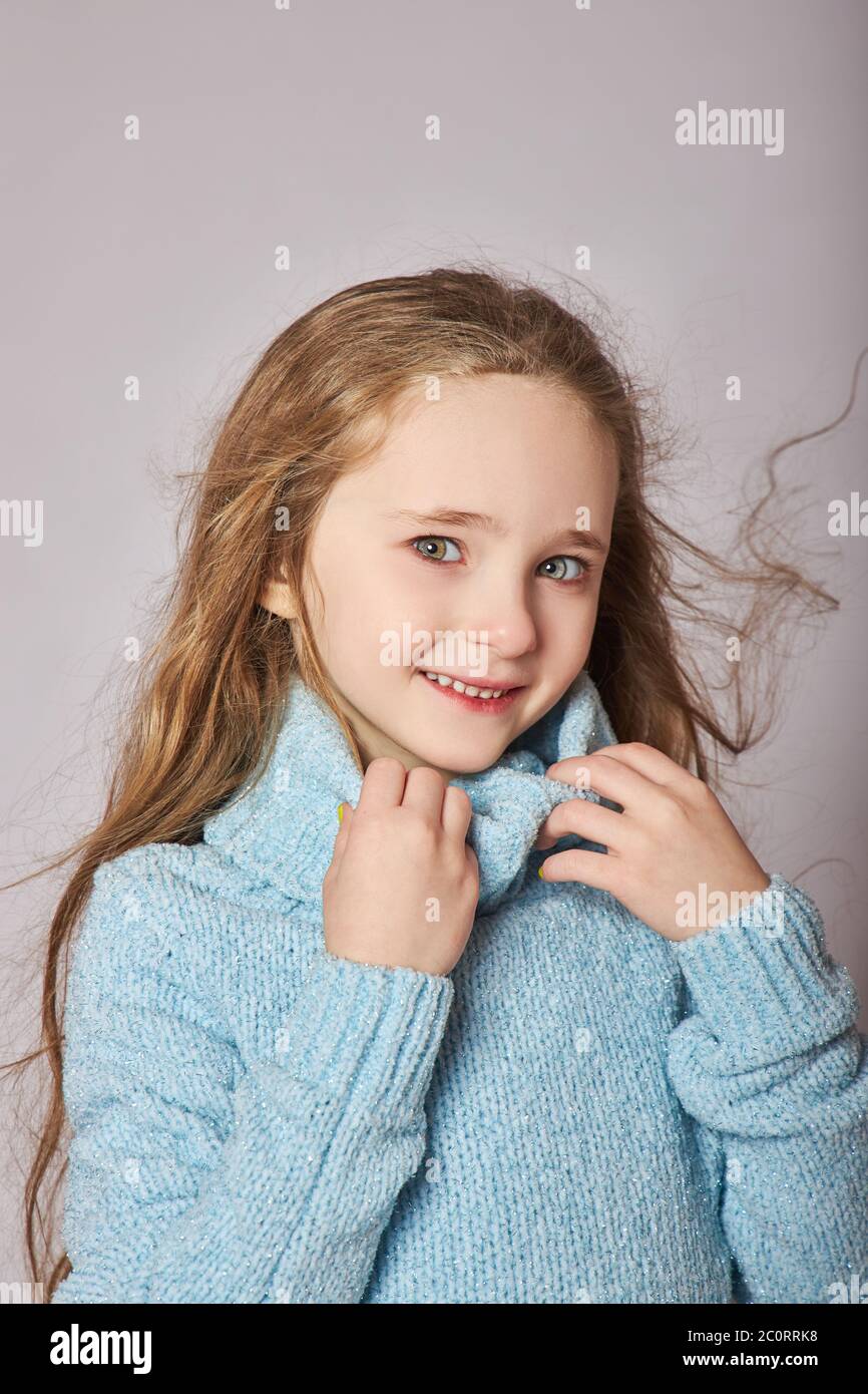 Portrait of a small smiling girl. Happy emotions Stock Photo - Alamy