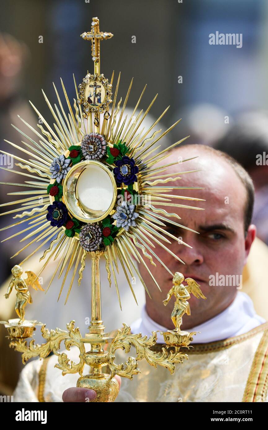 Holds a monstrance hi-res stock photography and images - Alamy