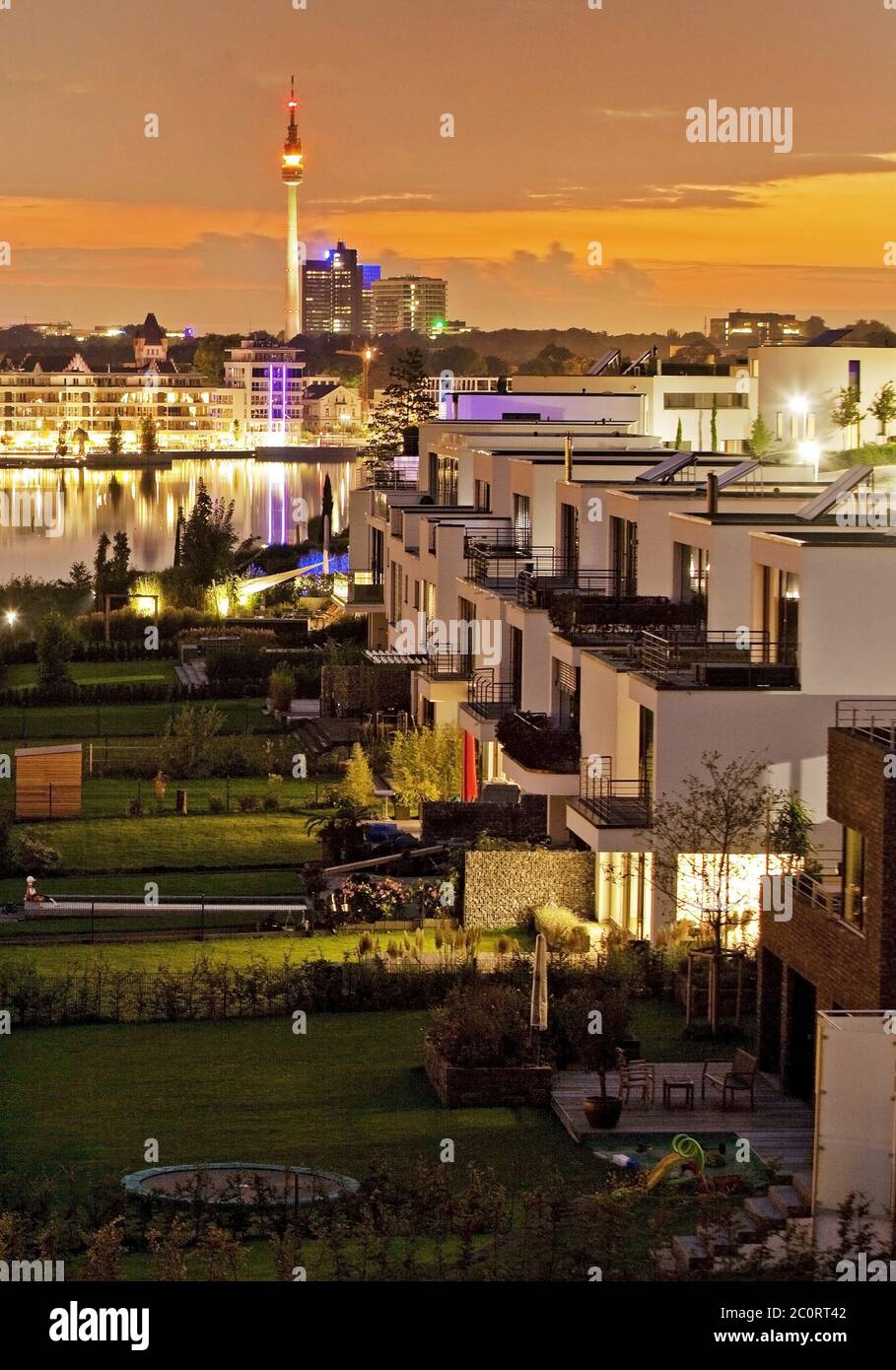 Phoenix Lake with residential areas and the Florian Tower at sunset ...