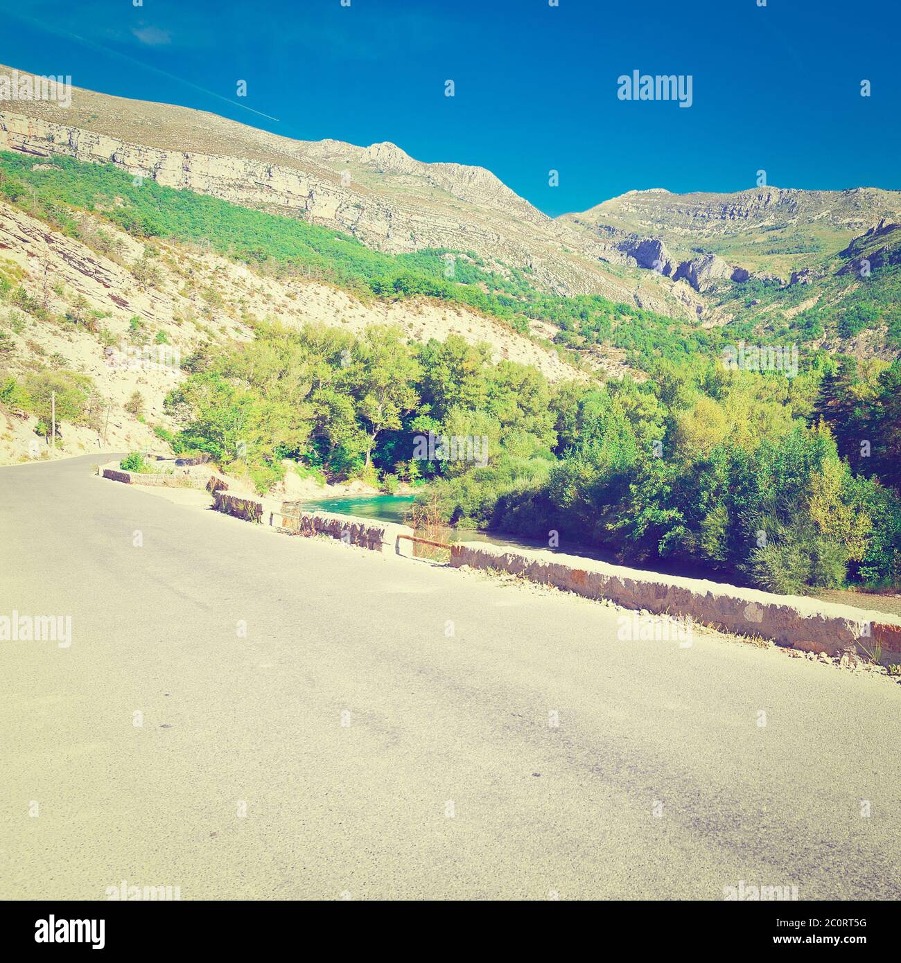 Road along River Stock Photo - Alamy