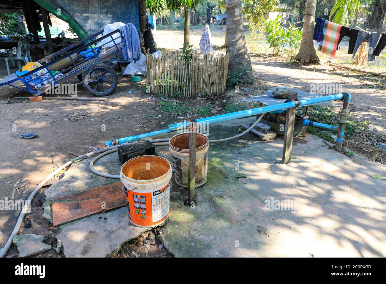A crude water pump in a village close to the Angkor Thom temple complex ...