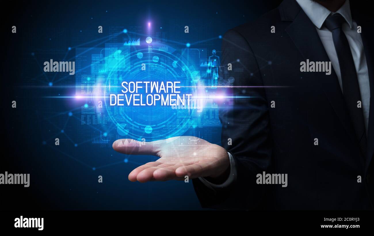 Man hand holding SOFTWARE DEVELOPMENT inscription, technology concept ...