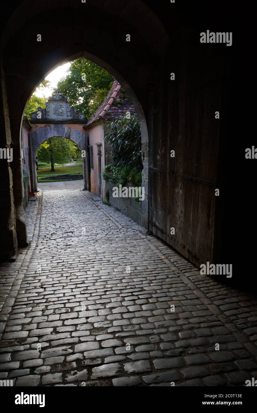 View out of town through the castle gate Stock Photo - Alamy