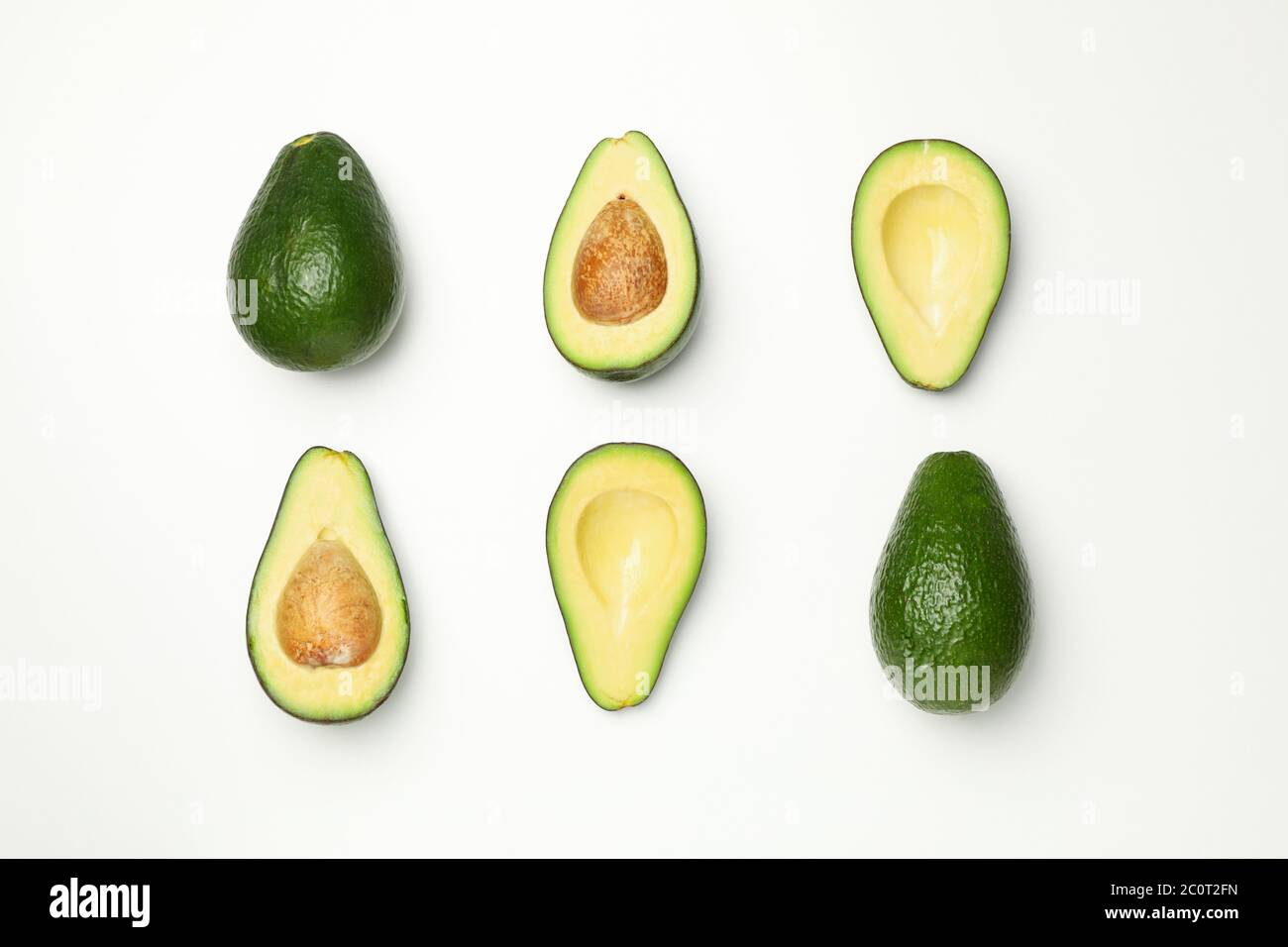 Flat lay with avocado on white background, top view Stock Photo - Alamy
