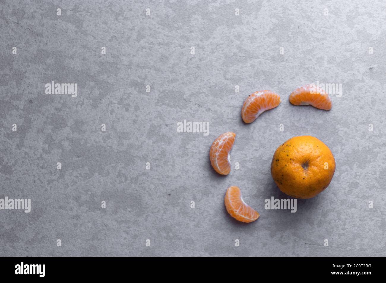 Fresh orange slices with nice textured background Stock Photo - Alamy