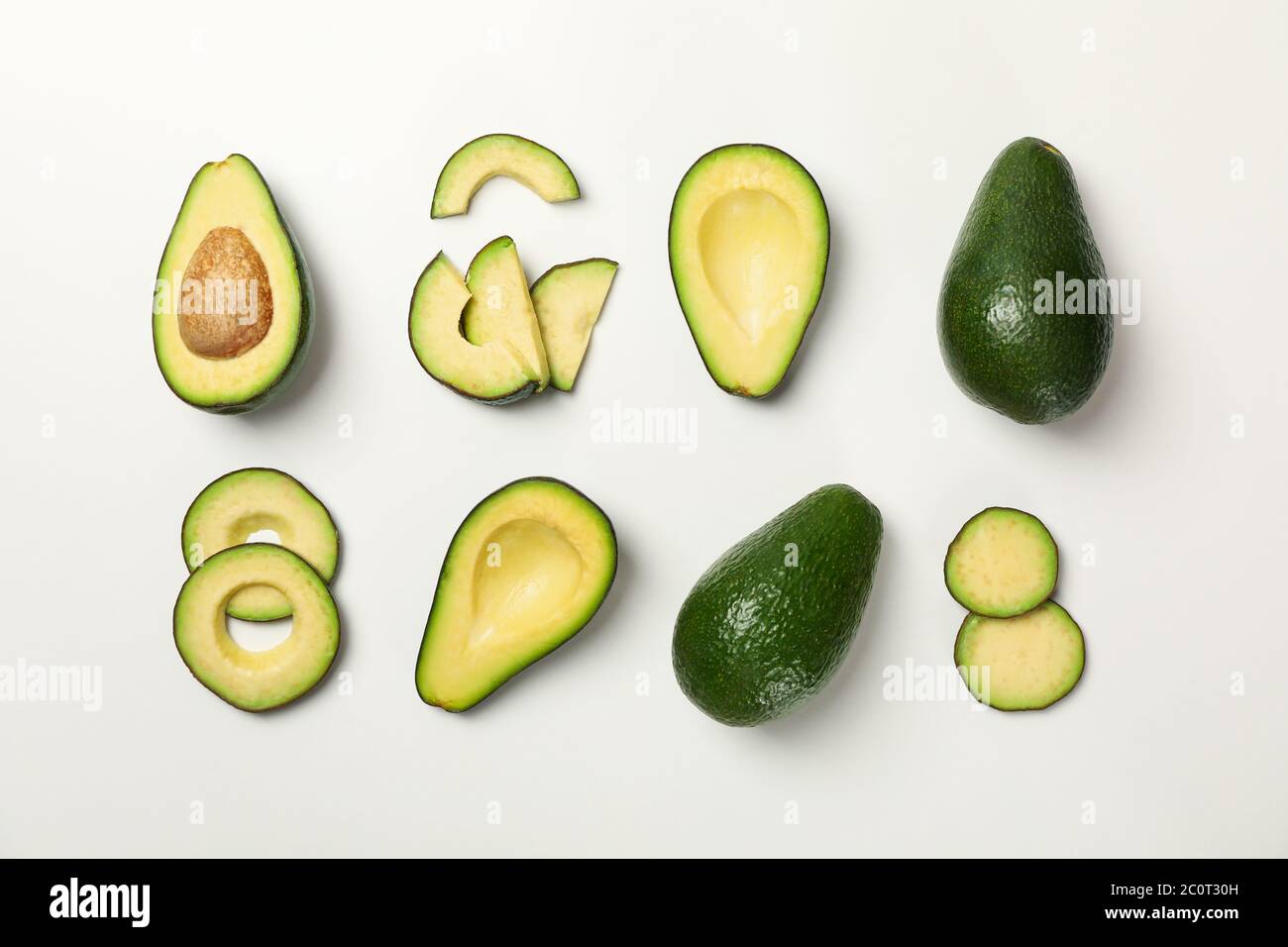Flat lay with avocado on white background, top view Stock Photo - Alamy
