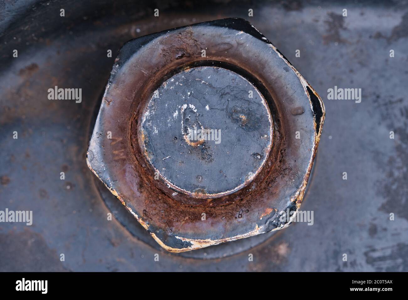 Rusty big nut with a bolt as background Stock Photo - Alamy