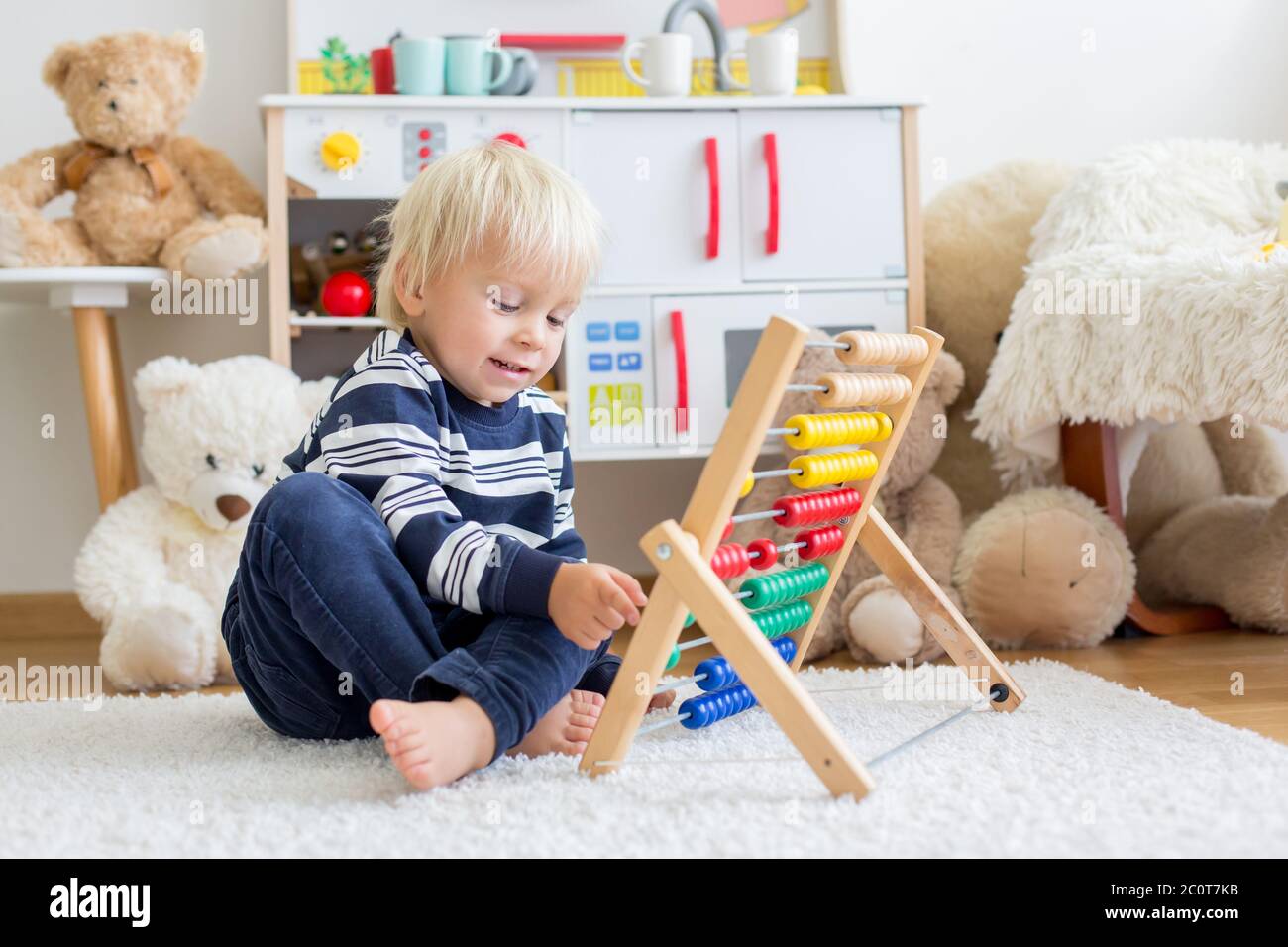 Children playing game calculator hi-res stock photography and images ...