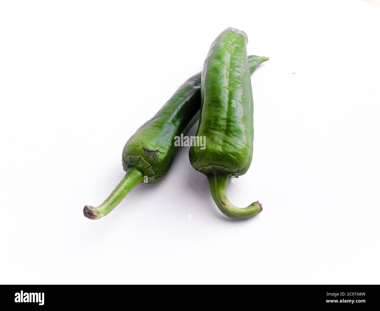 Green chilli isolated stock image Stock Photo - Alamy